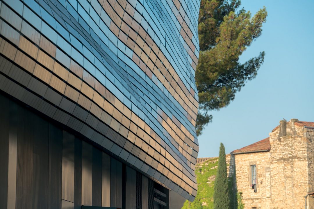 A French museum creates romance with a flowing glass tile facade ...