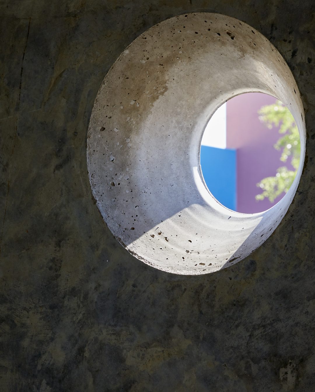 This concrete screen wall was inspired by the proportions of camera ...